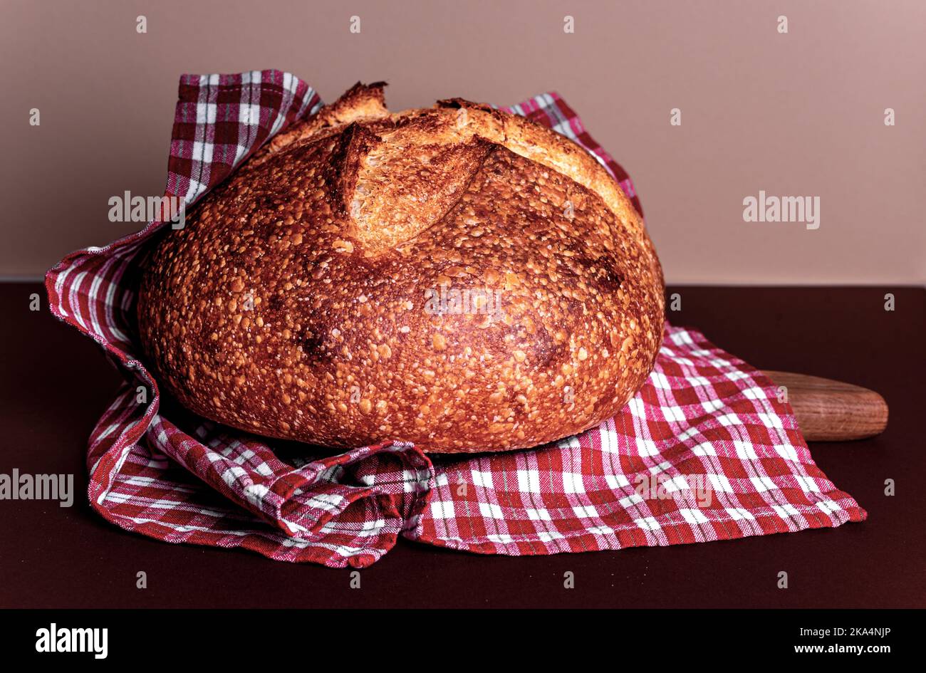 Sourdough bread with crispy crust on table. Bakery goods Stock Photo ...