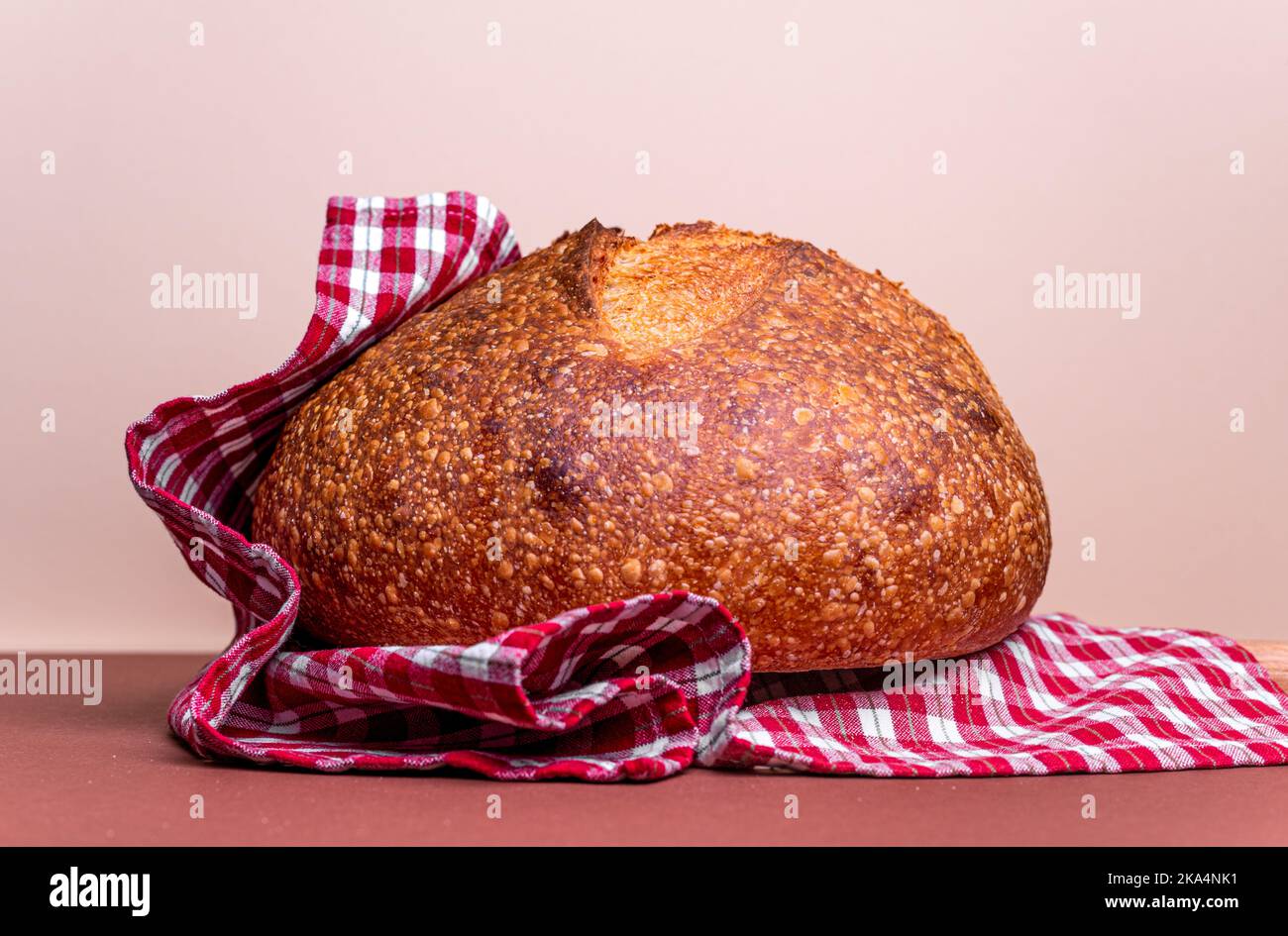 Sourdough bread with crispy crust on table. Bakery goods Stock Photo ...
