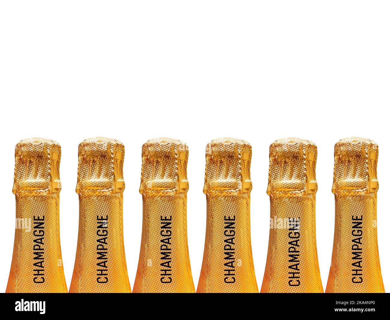 Row of champagne bottles covered in gold foil stamped with the word ...