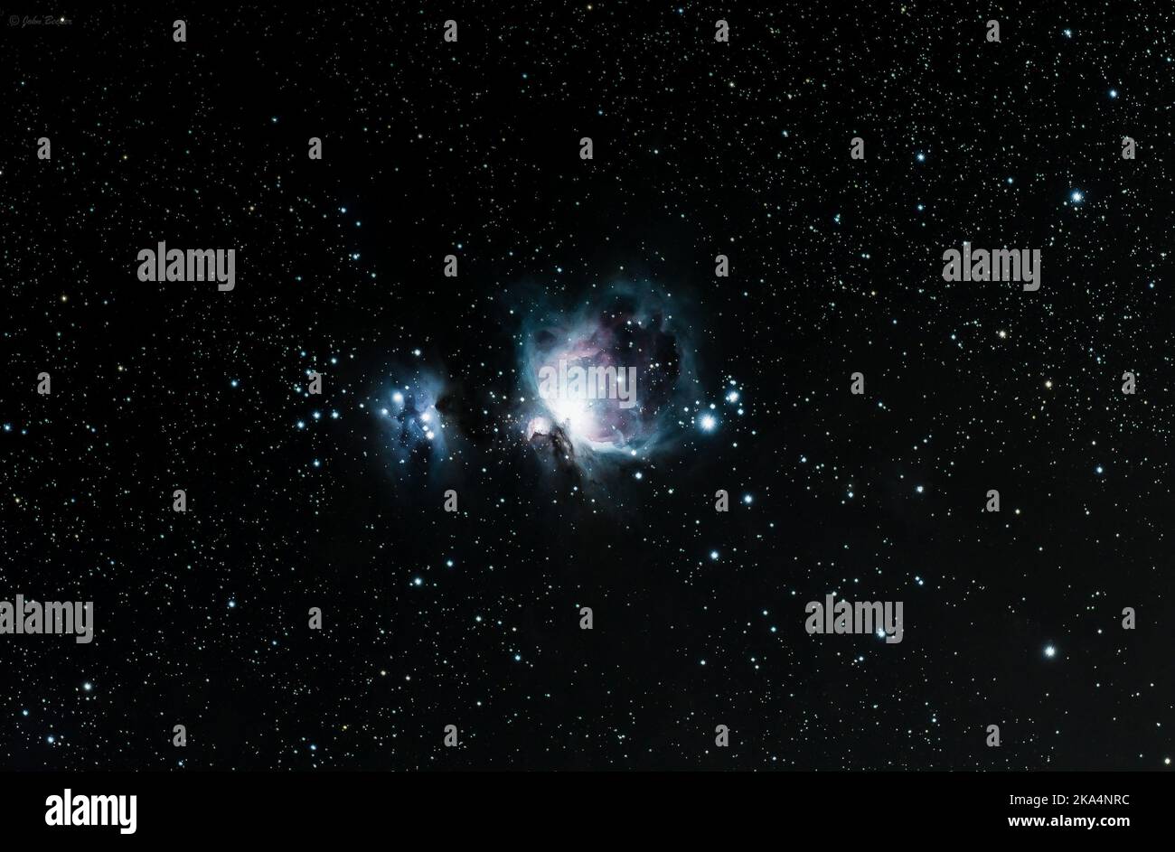 The Orion and Running man Nebula in the night sky Stock Photo - Alamy
