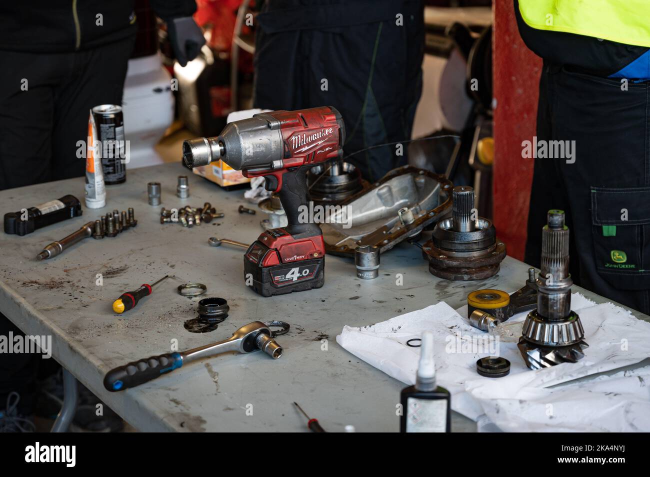 A mechanic is repairing a race car Stock Photo - Alamy