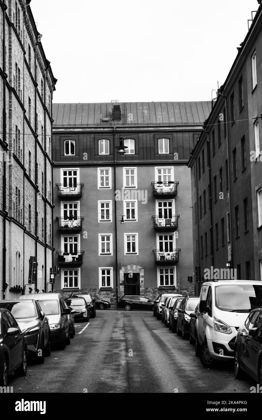Car on residential road Black and White Stock Photos & Images - Alamy