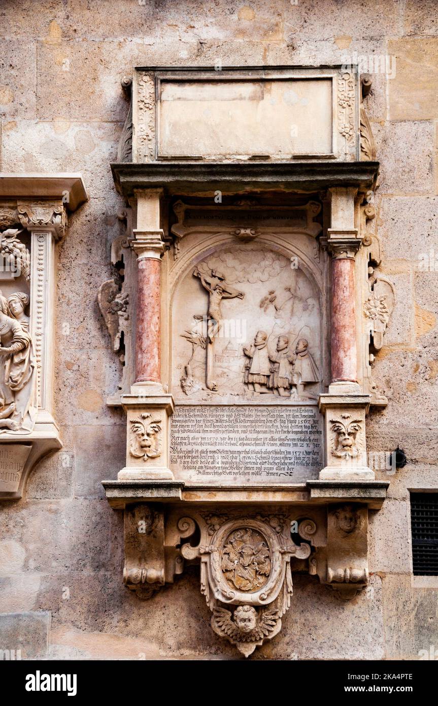 Romanesque bas-relief crucifixion scene with pink marble Doric columns ...