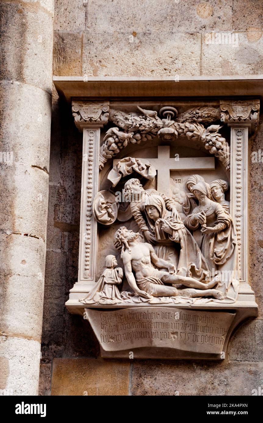 The Lamentation of Christ Romanesque bas-relief crucifixion scene on the West front of St ...