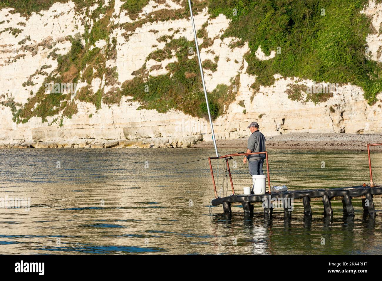 Beer Beach Devon. Fishing from the Jetty Stock Photo - Alamy