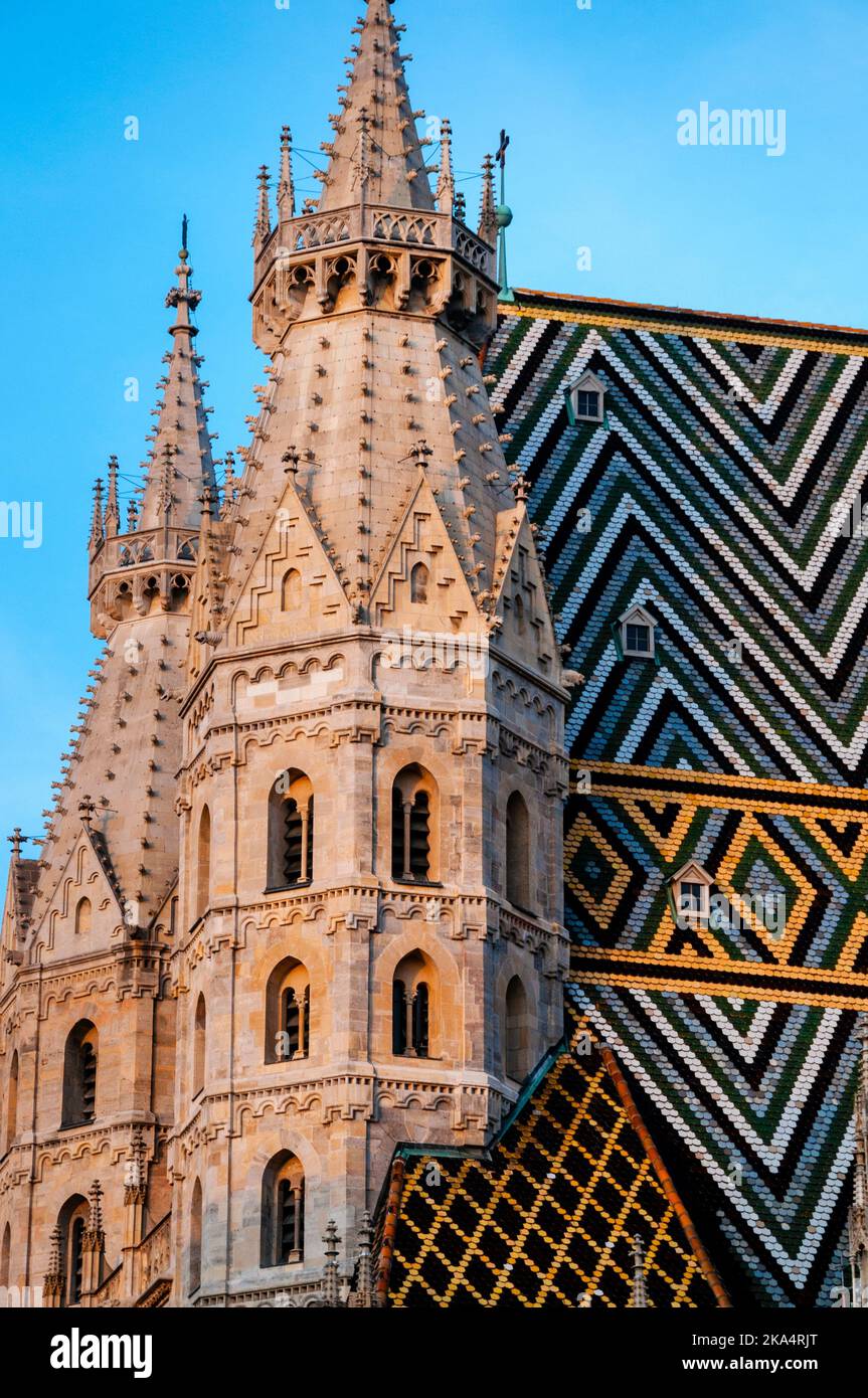 Romanesque towers and multicolored tile roof of St. Stephen's Cathedral ...