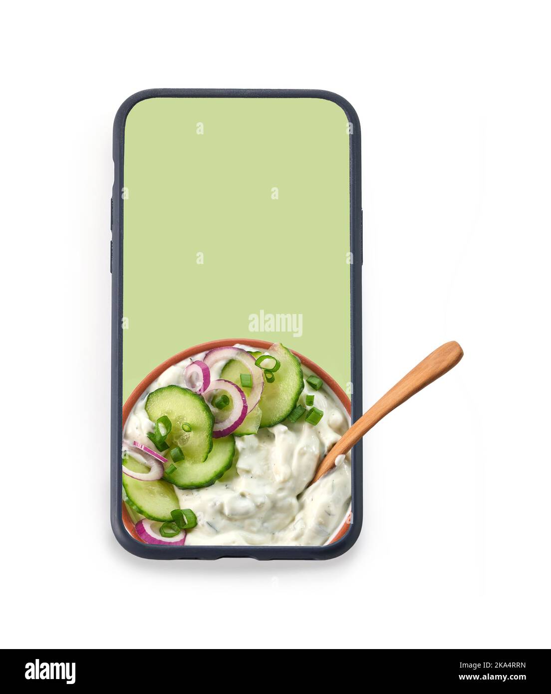 bowl of greek yogurt in the smartphone screen isolated on white ...