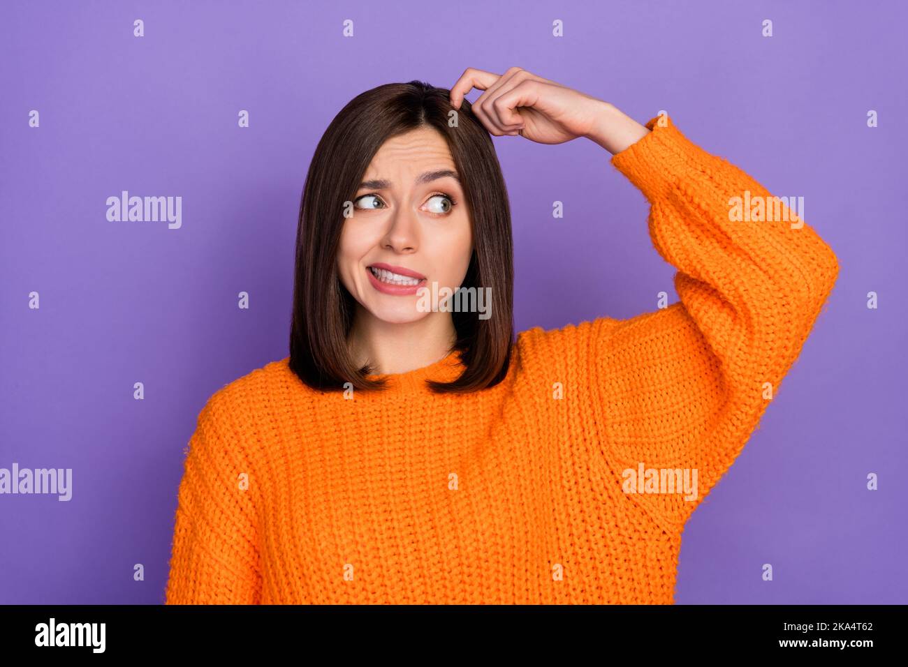 Photo of minded pretty girl look interested empty space finger scratch ...