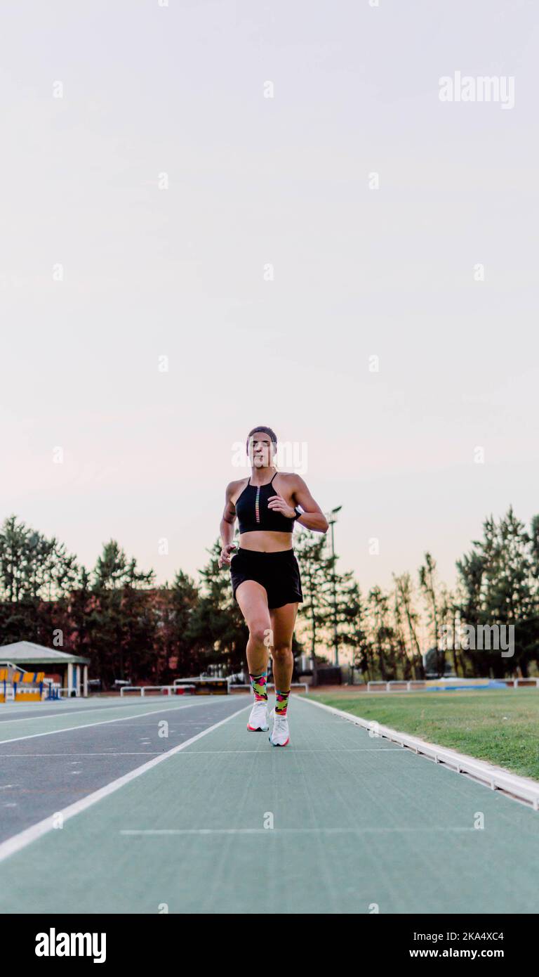 Girl running on athletics hi-res stock photography and images - Alamy
