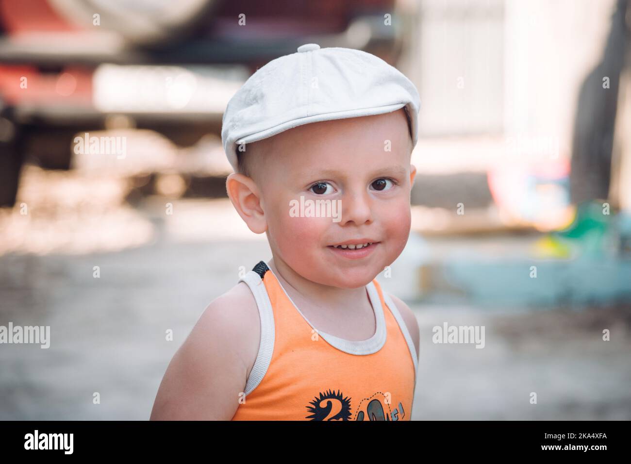 Portrait of smiling little boy looking to camera Stock Photo - Alamy