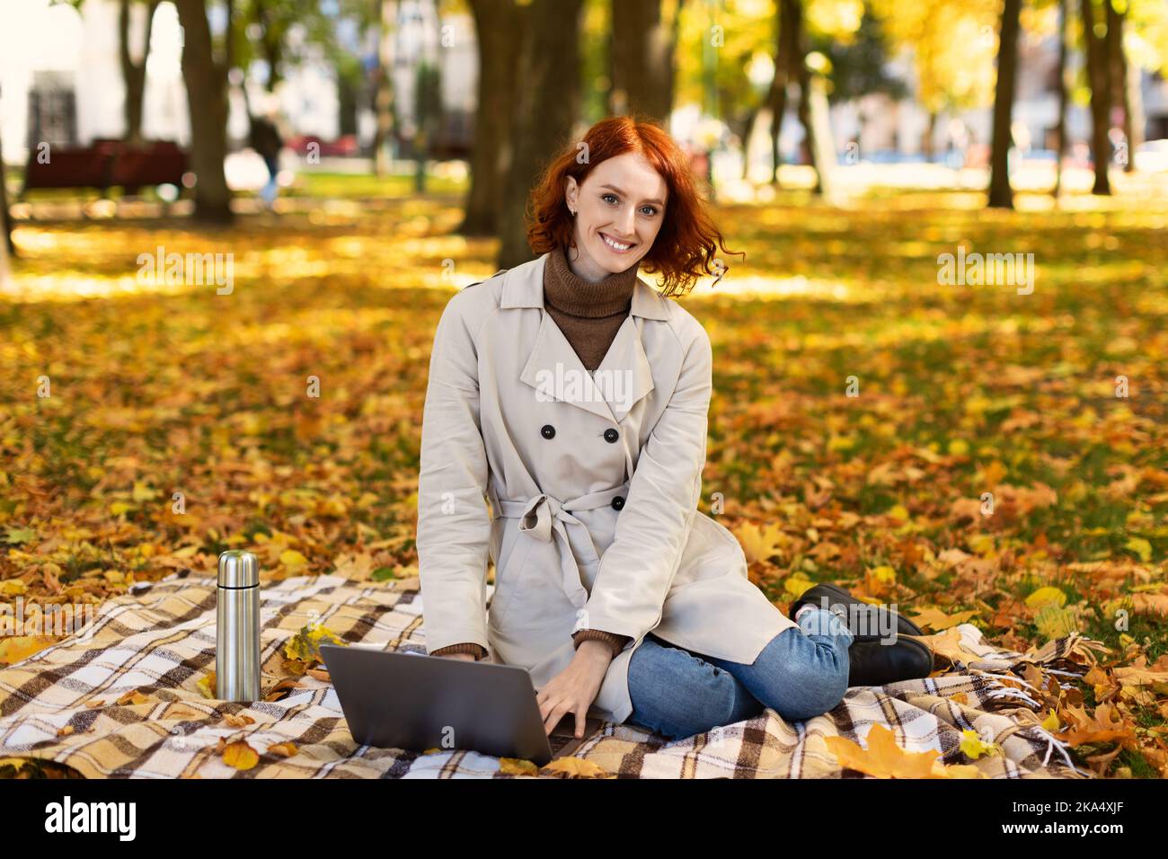 Typing student in red hi-res stock photography and images - Alamy