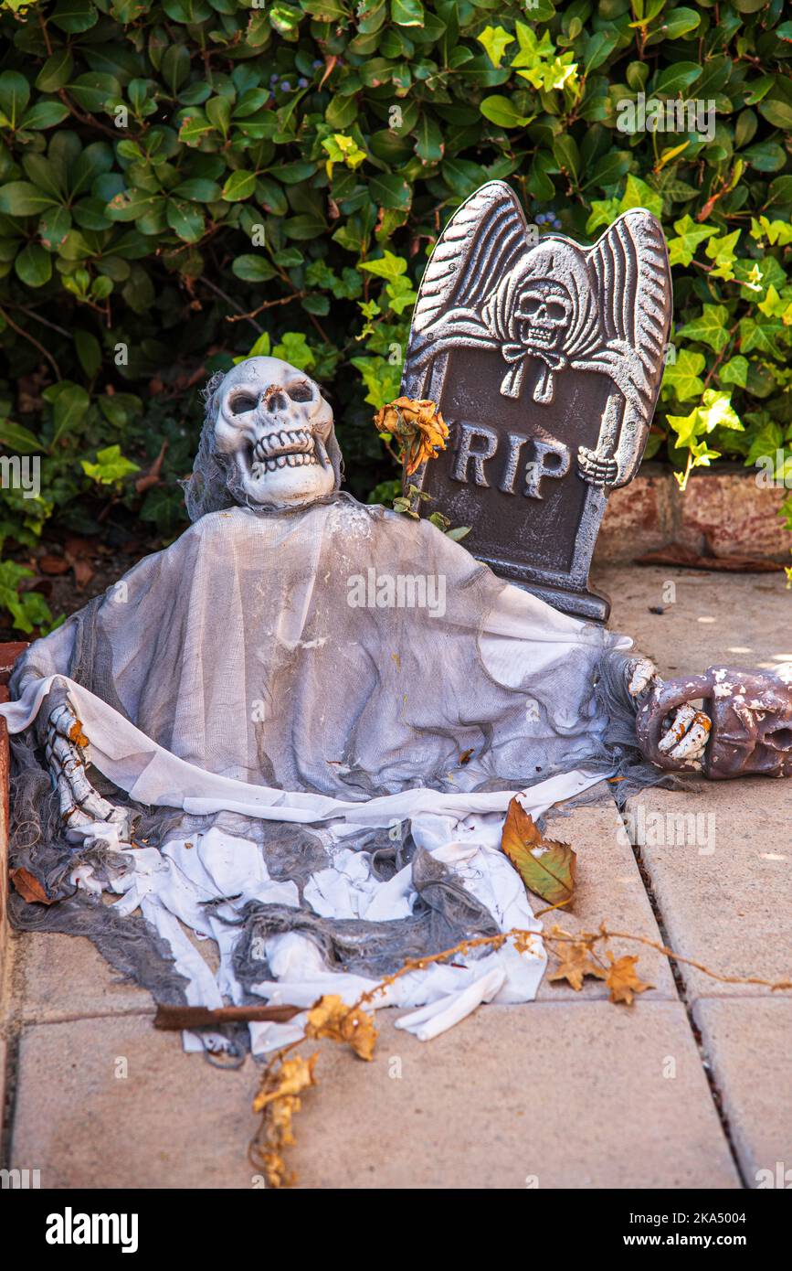 A skull ghost and tombstone with an RIP design,Halloween decorations ...