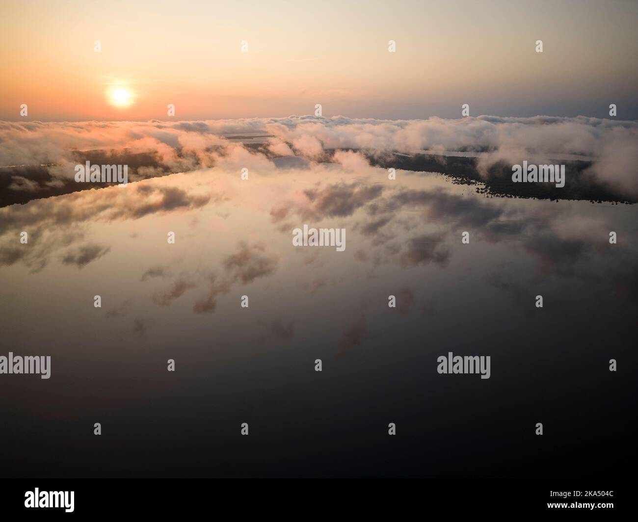 Beautiful aerial view to green amazon rainforest, clouds and islands ...