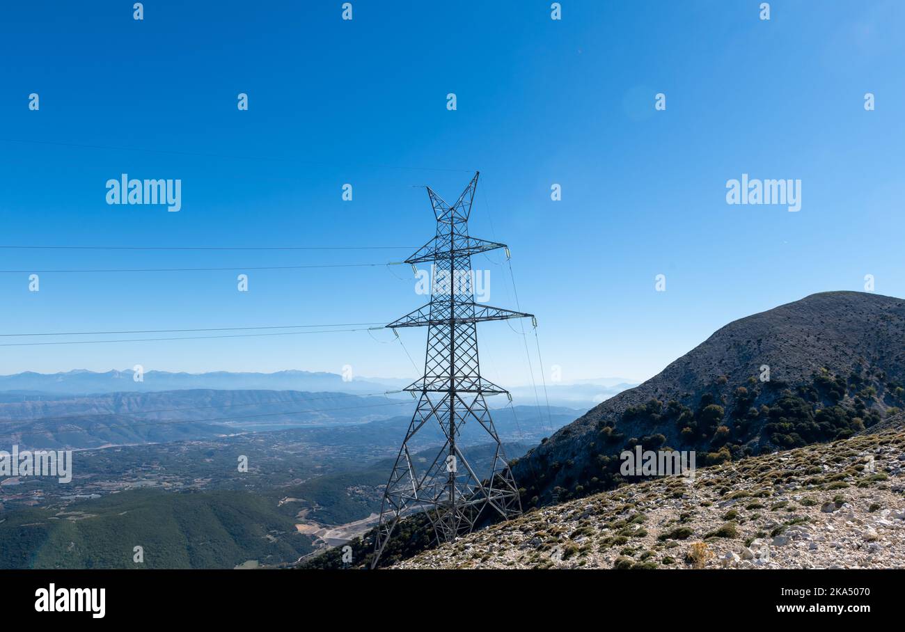 A electricity transmission tower or pylon on top of mountain Stock ...