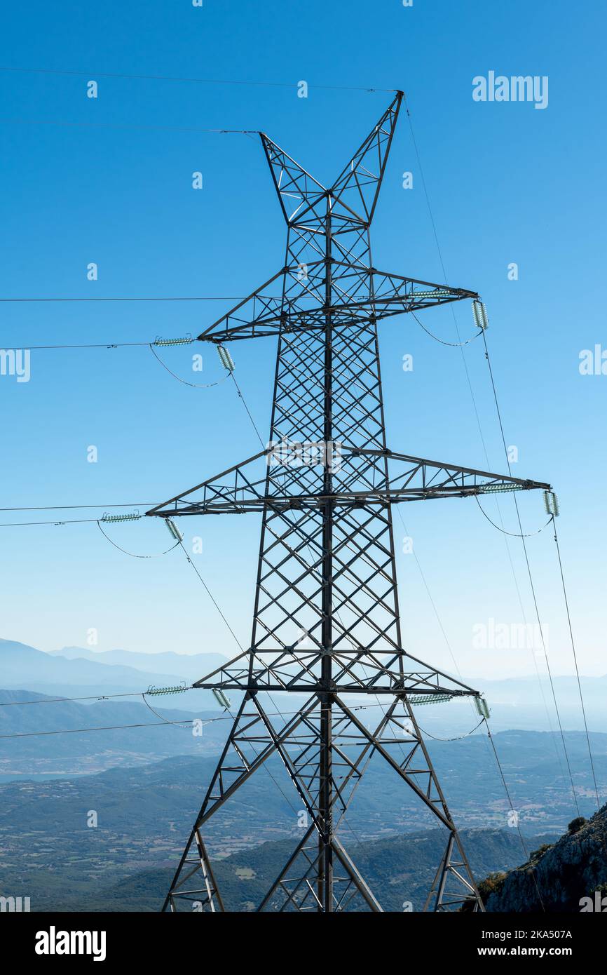 A electricity transmission tower or pylon on top of mountain Stock ...