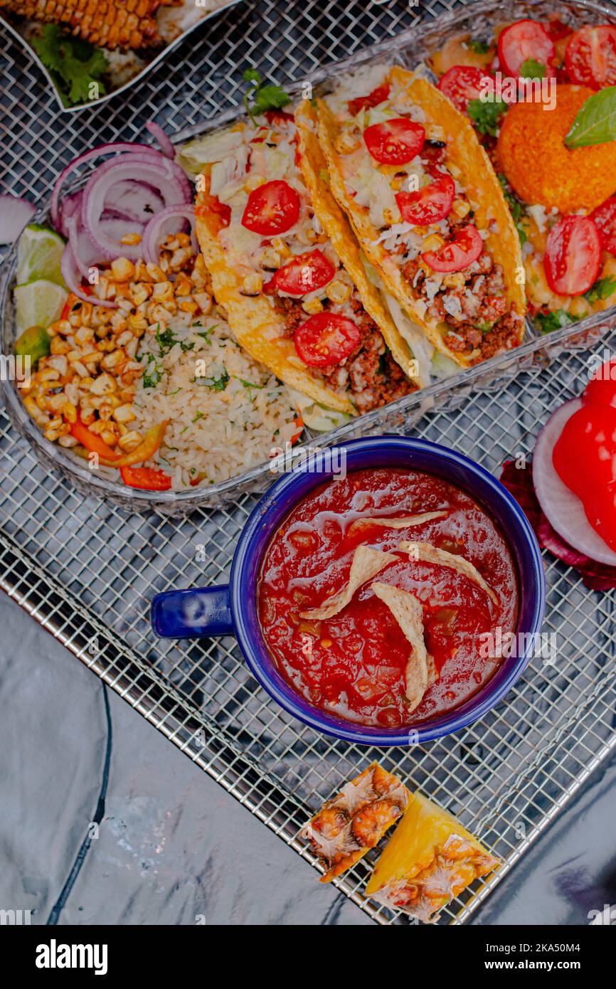 Fiesta Plate with Bowl of Salsa Stock Photo - Alamy