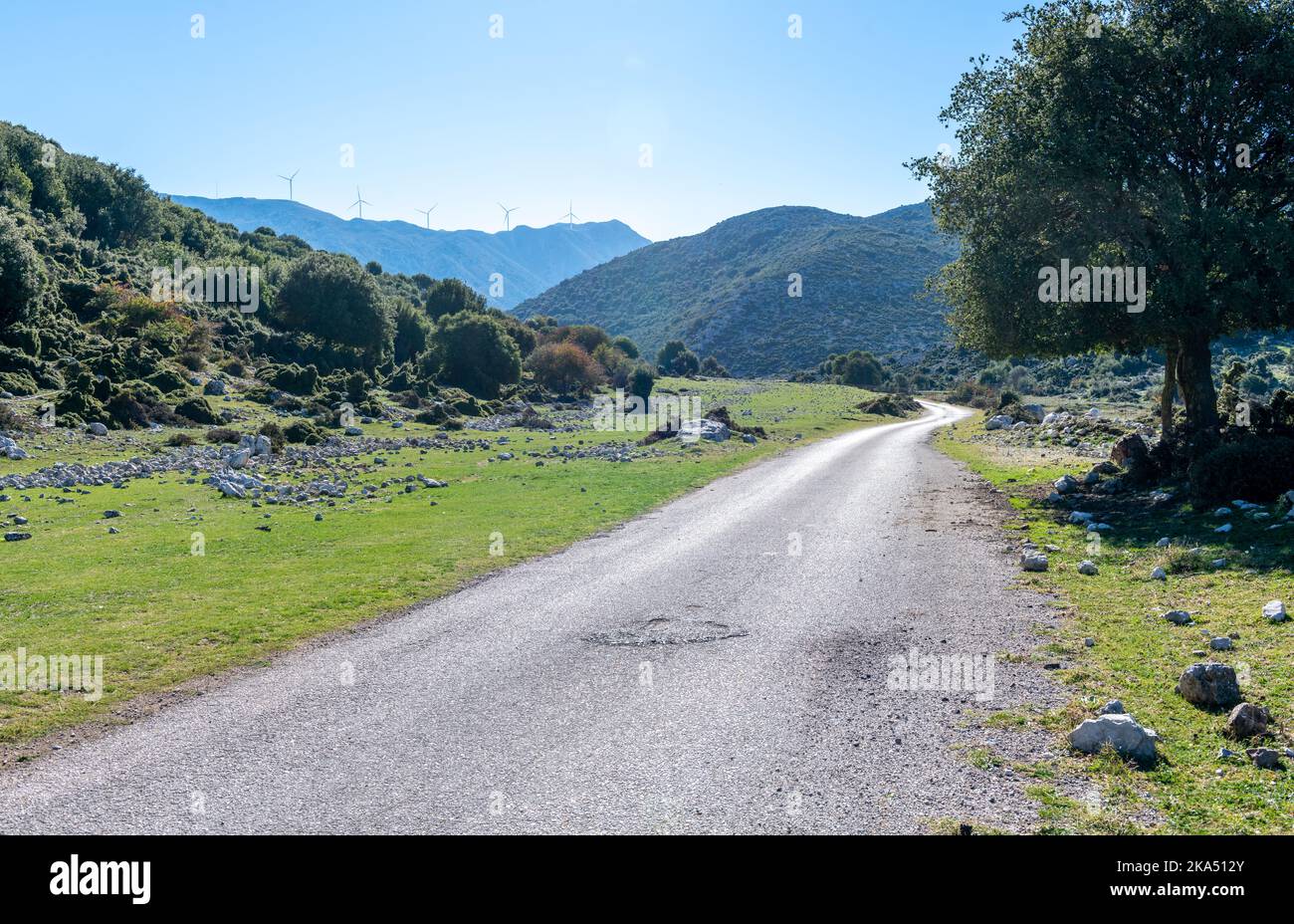 Rural road leading to hill hi-res stock photography and images - Alamy