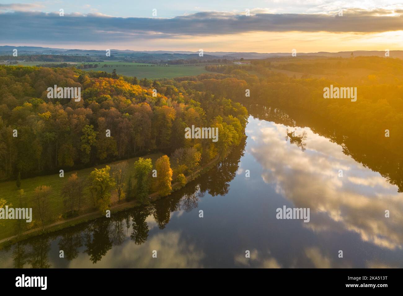 Water reflection at sunset time. Evening autumn landscape. Czech ...
