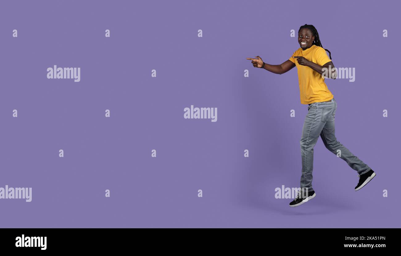 Cheerful excited man running jumping hi-res stock photography and ...