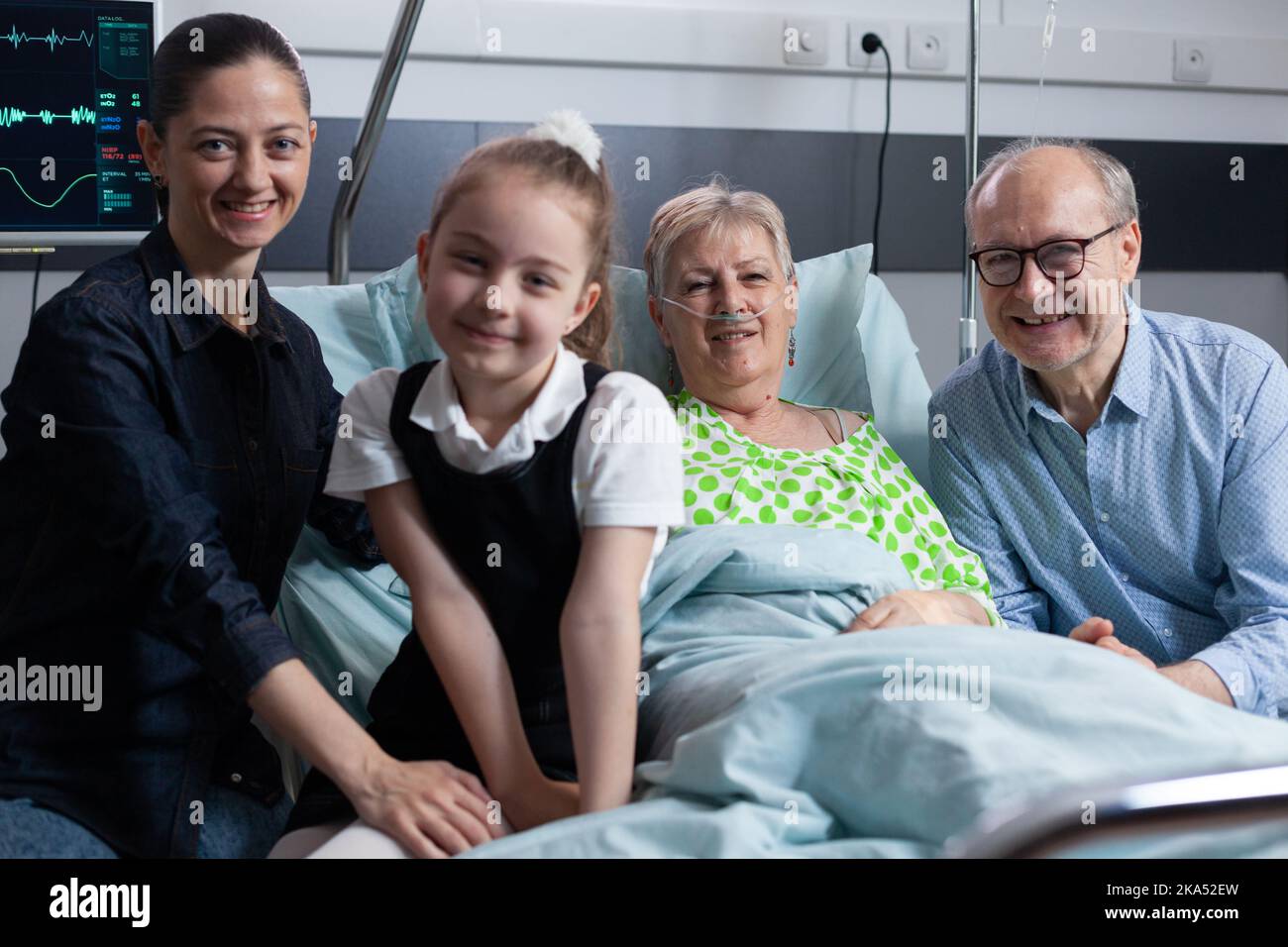 Happy family reunited in grandmother recovery room after successful ...