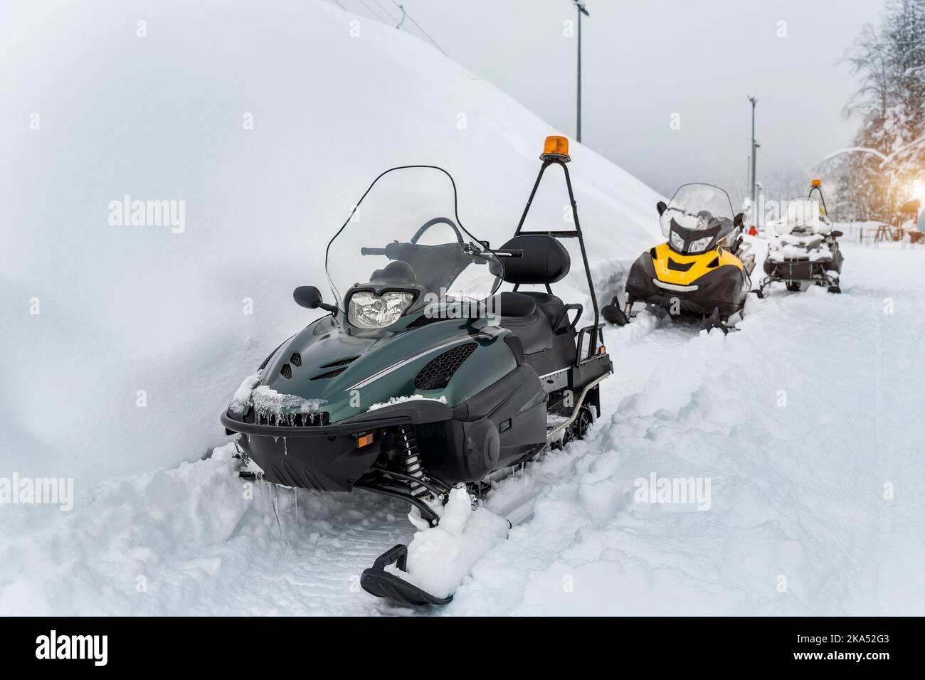 Front scene view many modern snow mobile scooter atv vehicle forest ...