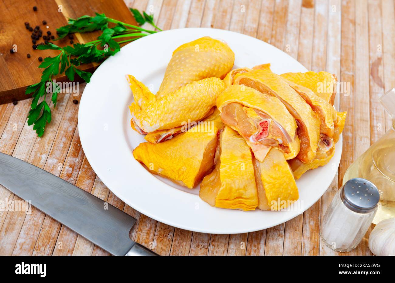 Fresh raw chopped chicken pieces Stock Photo - Alamy