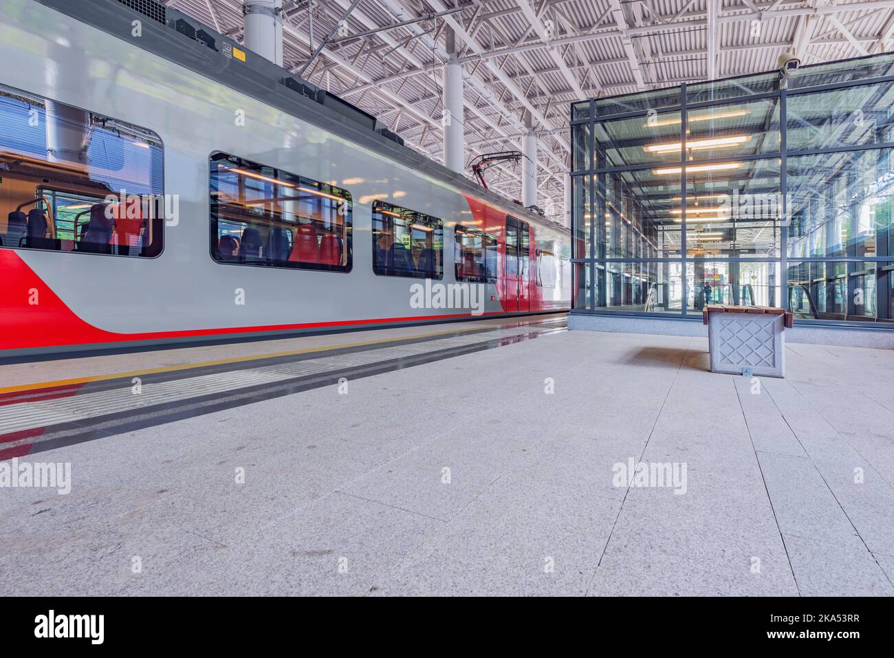 Passenger train stands by the platform before departure Stock Photo - Alamy