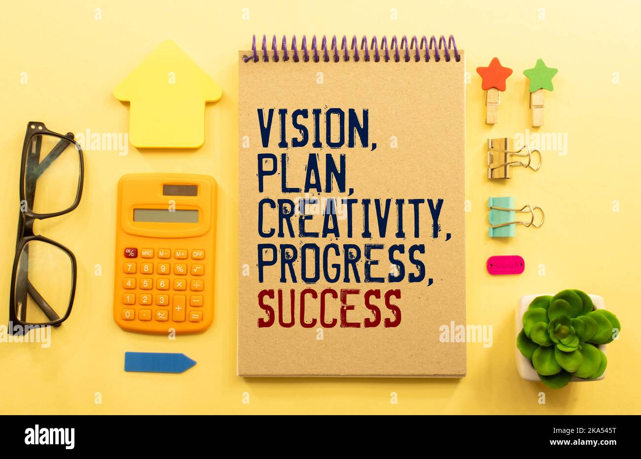 Male hand placing a block with word 'success' on top of a blocks tower ...