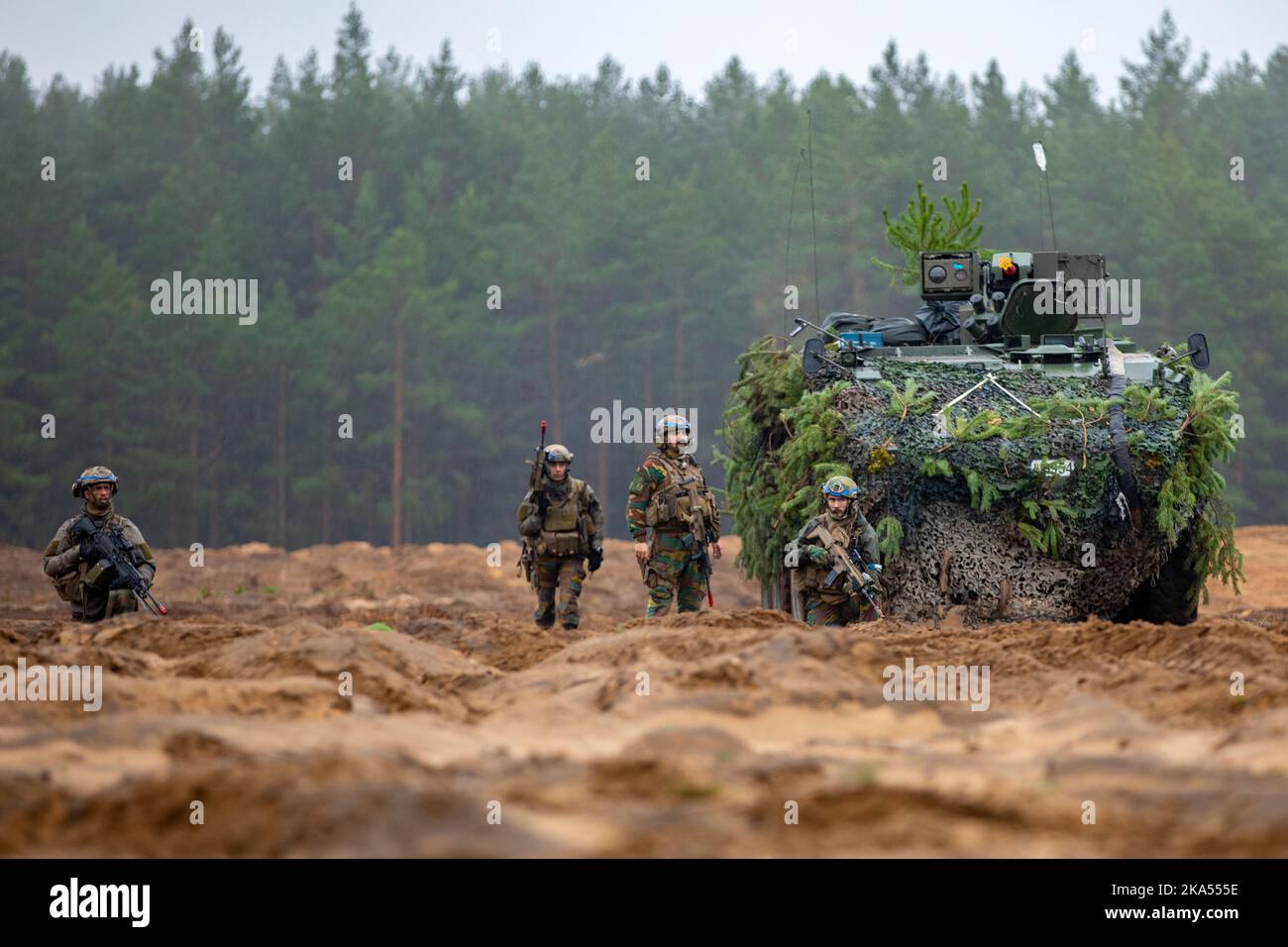 Belgium Armed Forces soldiers dismount a Enhanced Forward Protection ...