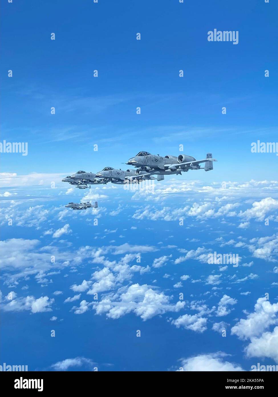 Six A-10C Thunderbolt IICs from the 74th Fighter Squadron, fly above ...