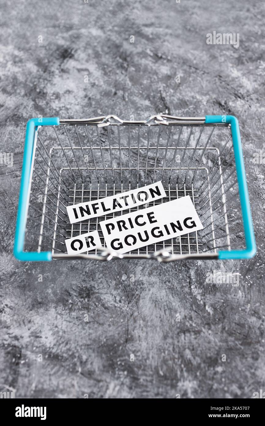 inflation or price gouging text with shopping basket representing ...