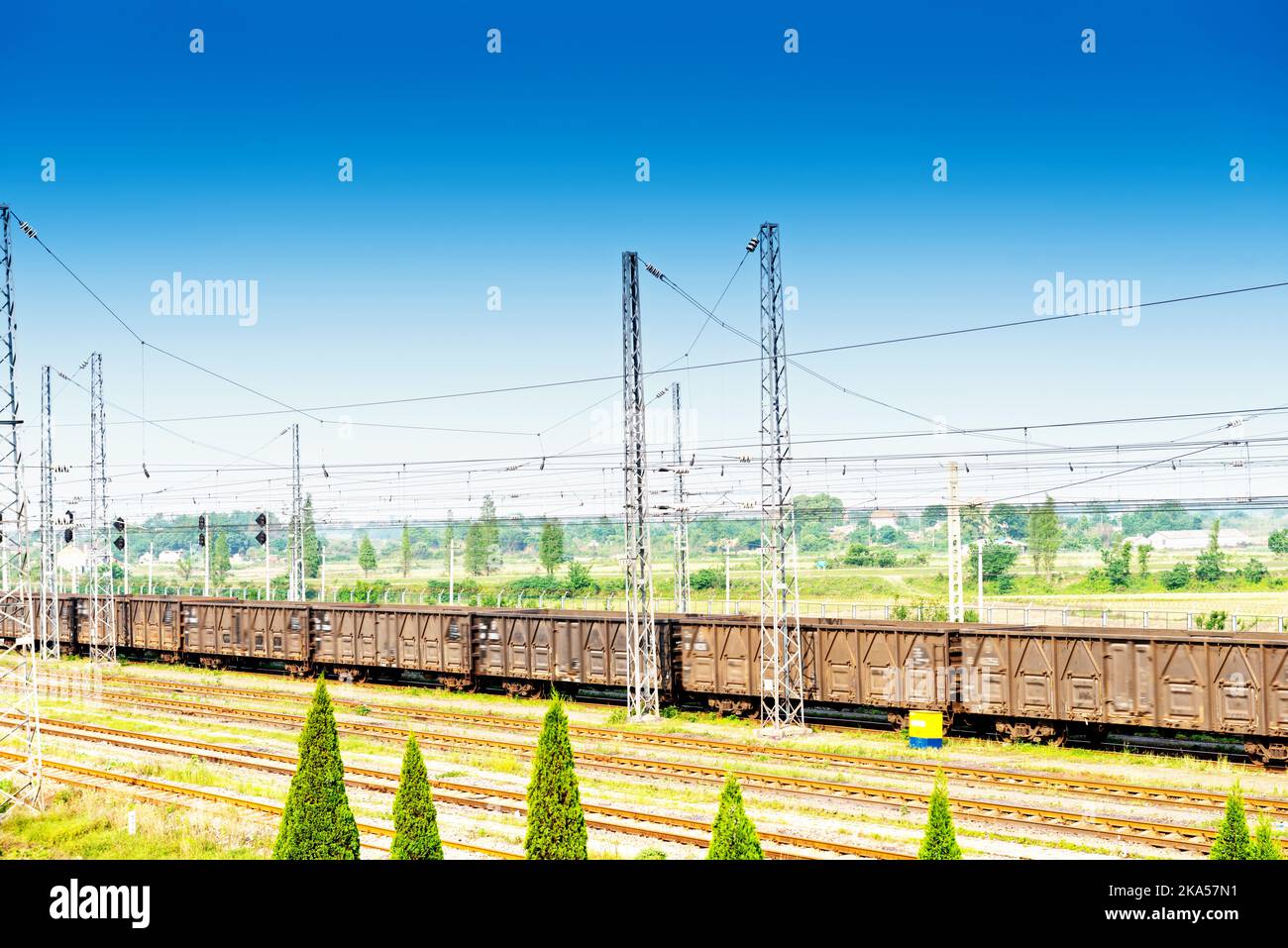 Cargo train platform at sunset with container Stock Photo - Alamy