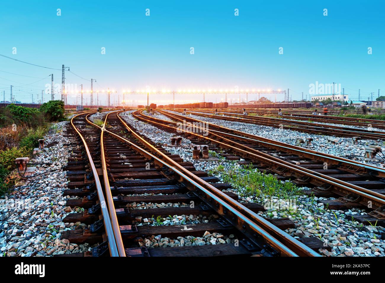 Cargo train platform at sunset with container Stock Photo - Alamy