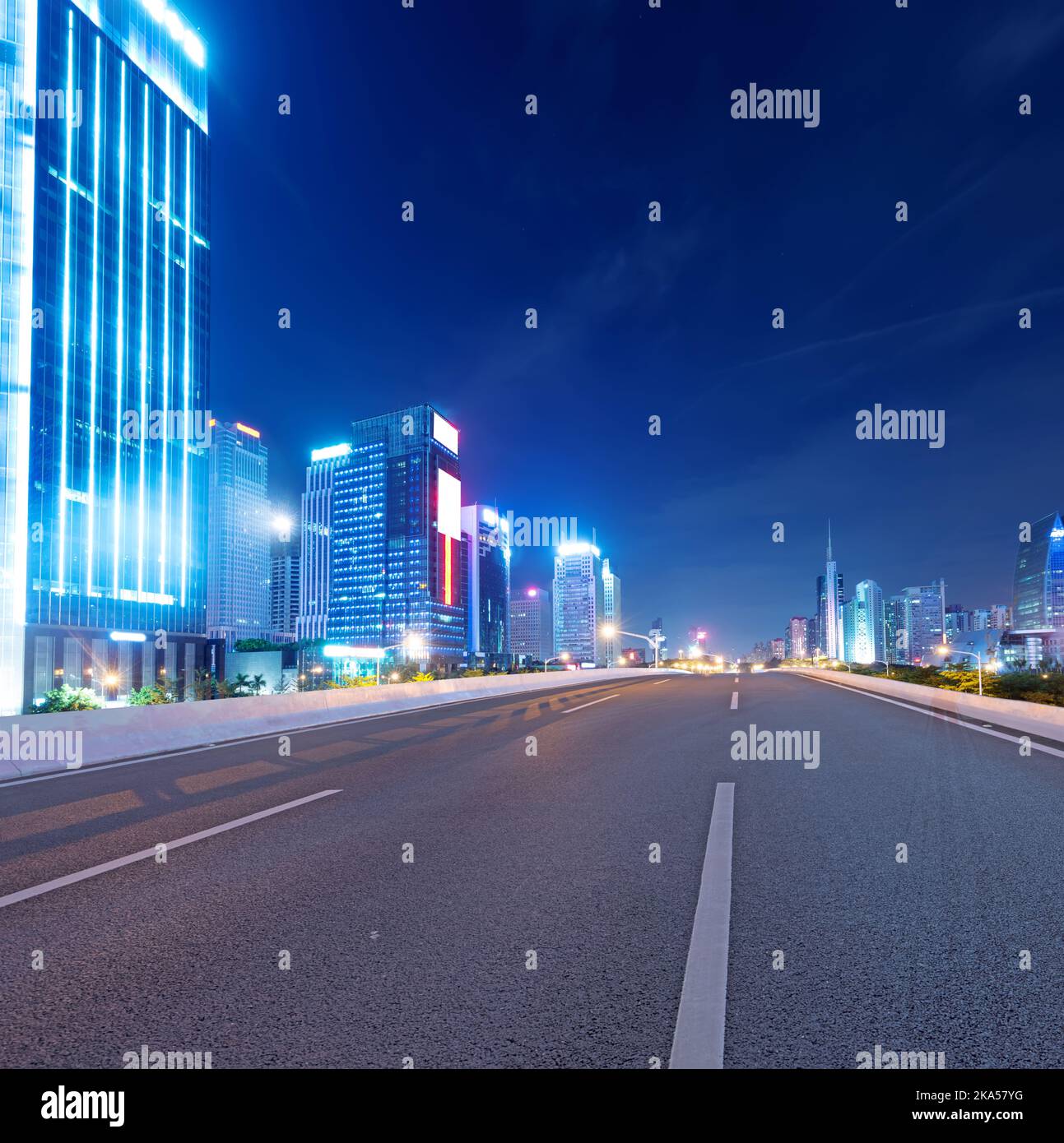 Asphalt road and modern city Stock Photo - Alamy