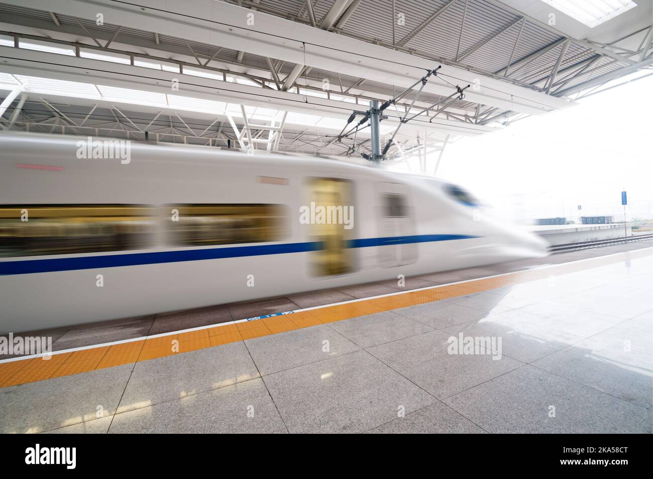 train stop at railway station Stock Photo - Alamy