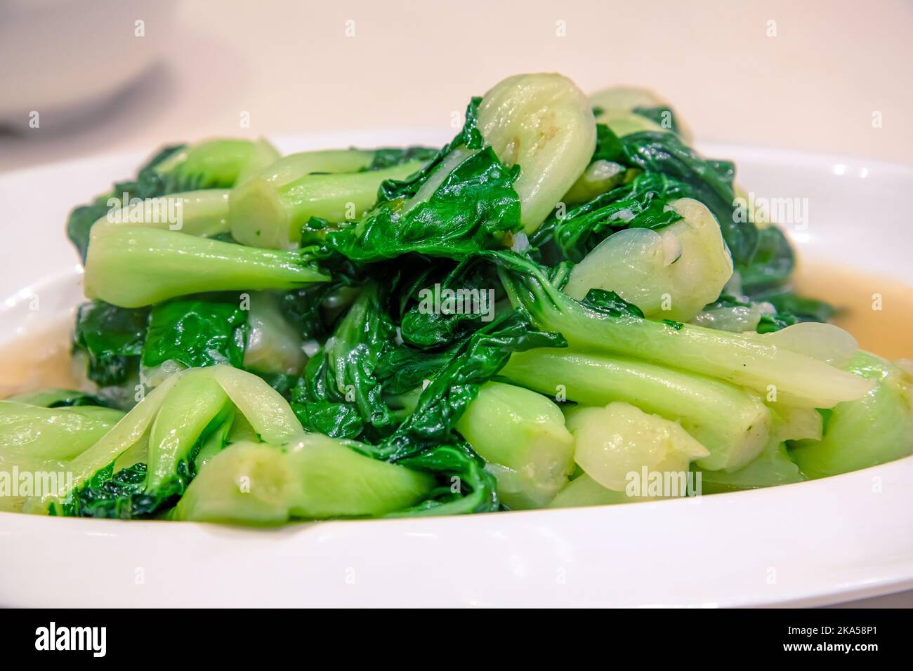 Chinese Stir Fried Bok Choy in Garlic, Hong Kong, China Stock Photo - Alamy