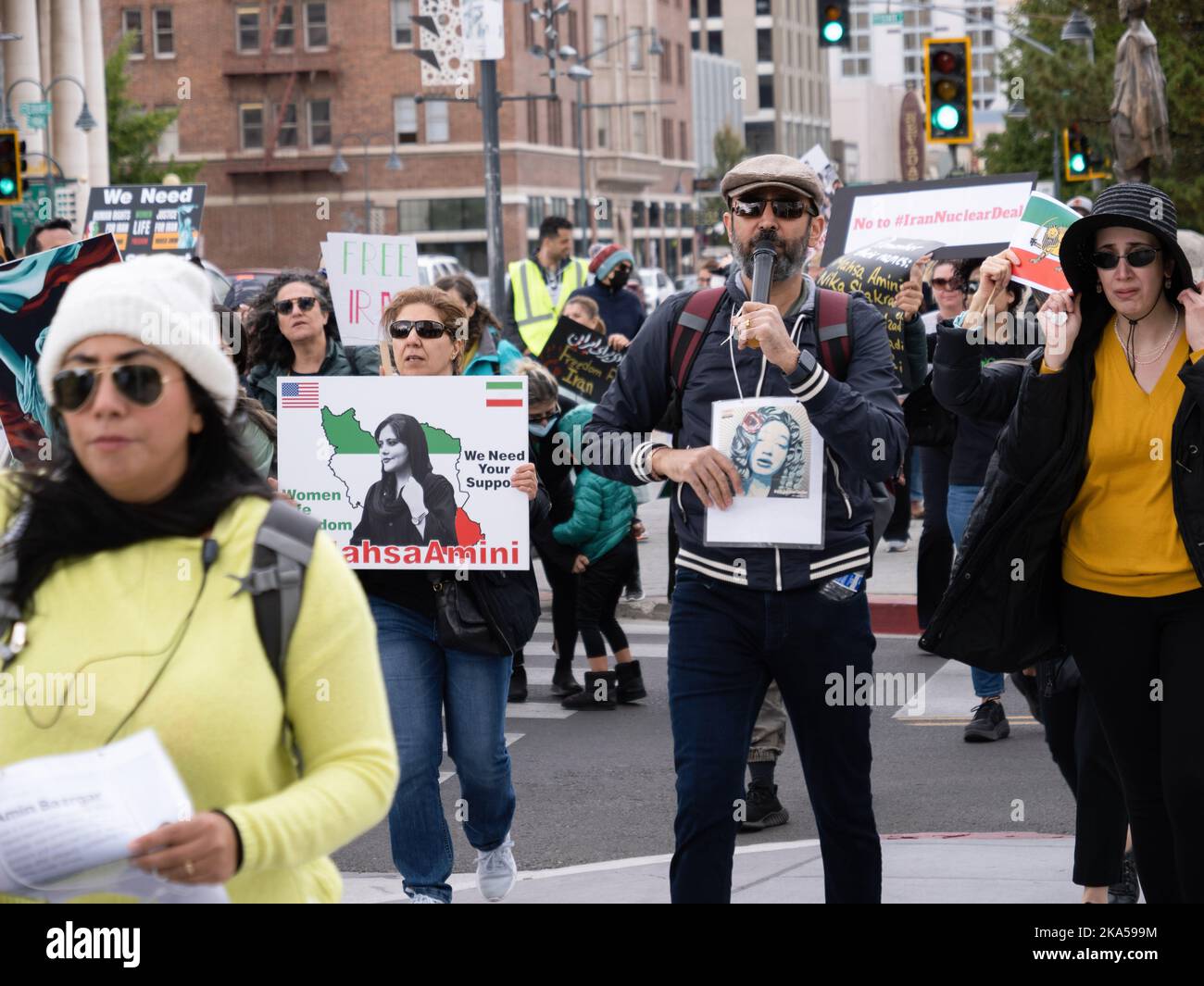 Reno, Nevada, USA. 22nd Oct, 2022. Protesters hold placards and chant ...