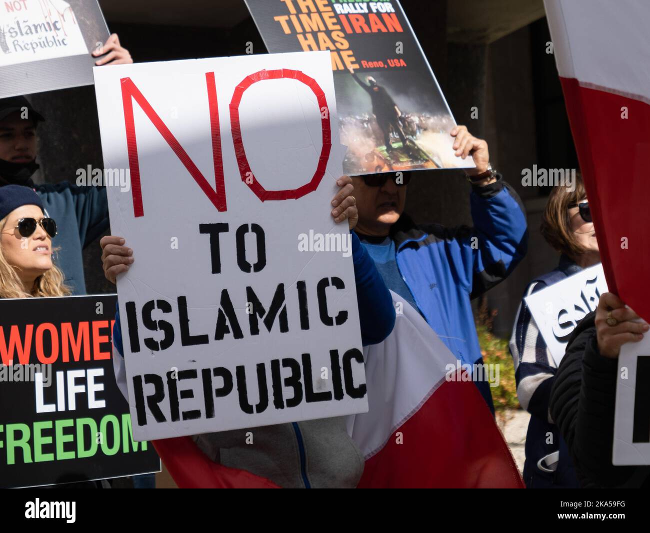 Reno, Nevada, USA. 22nd Oct, 2022. A protester carrying a sign that ...