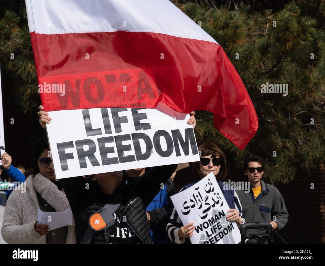 Reno, Nevada, USA. 22nd Oct, 2022. A protester carries an Iranian flag ...