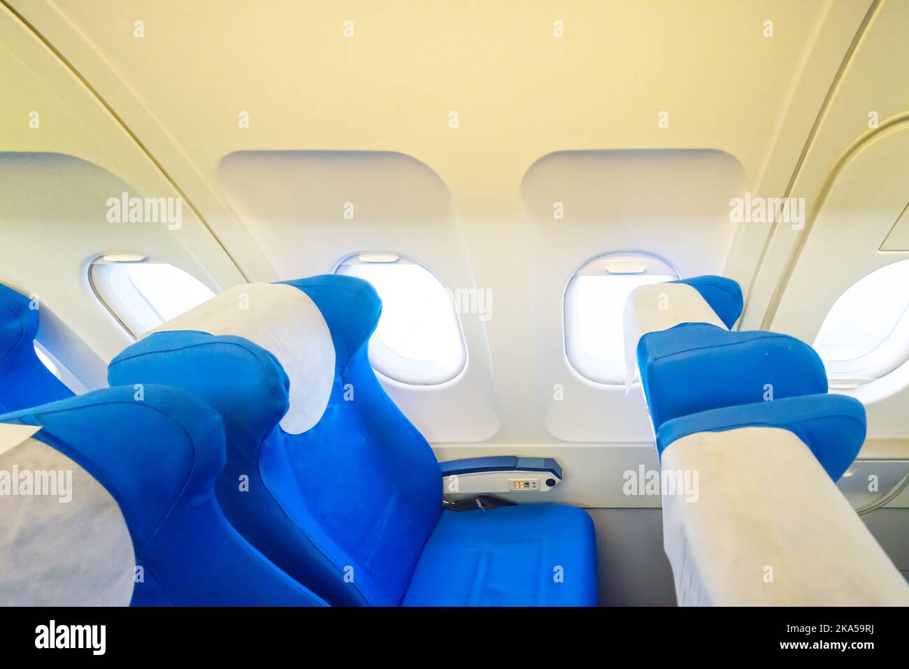 Empty aircraft seats and windows Stock Photo - Alamy