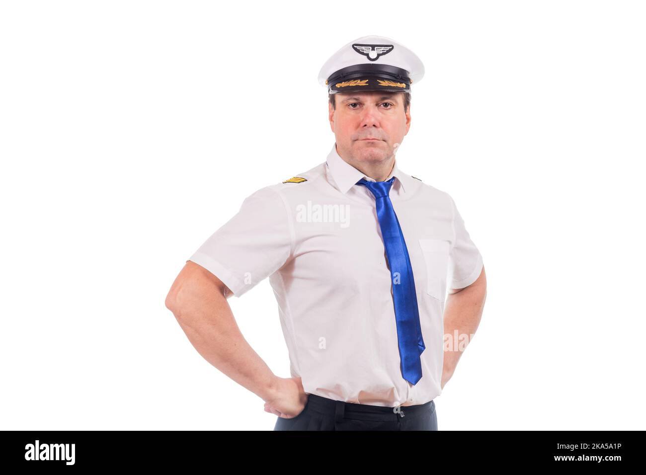 The pilot is looking at the camera, isolated on a white background ...