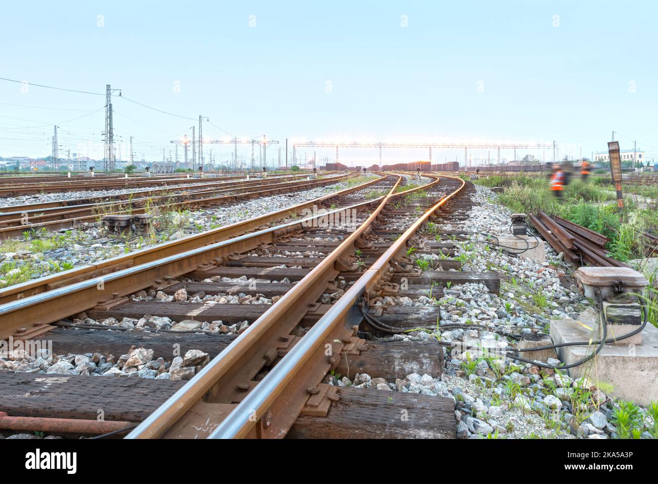 Cargo train platform at sunset with container Stock Photo - Alamy