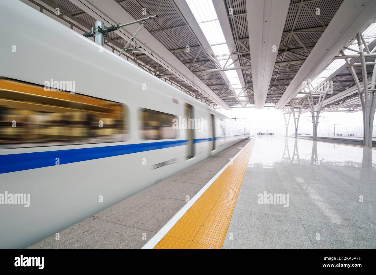train stop at railway station Stock Photo - Alamy