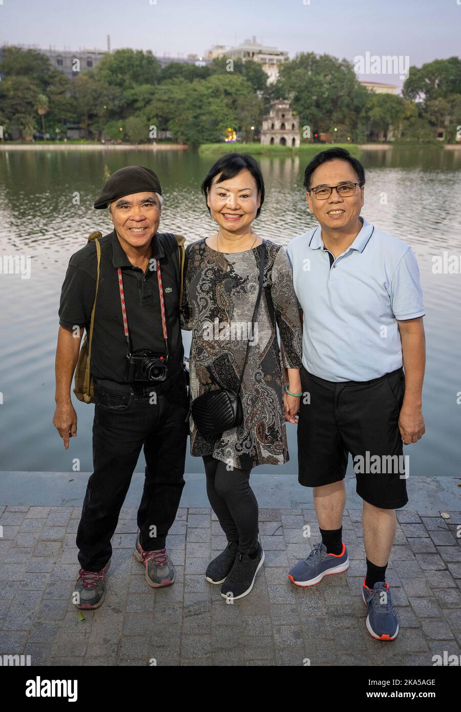 Hanoi, Vietnam. 1st Nov, 2022. (Left to Right) Nick Ut, Kim Phuc and ...