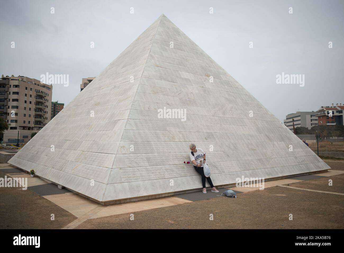 Malaga, Spain. 31st Oct, 2022. A woman takes selfies on the facade of a ...