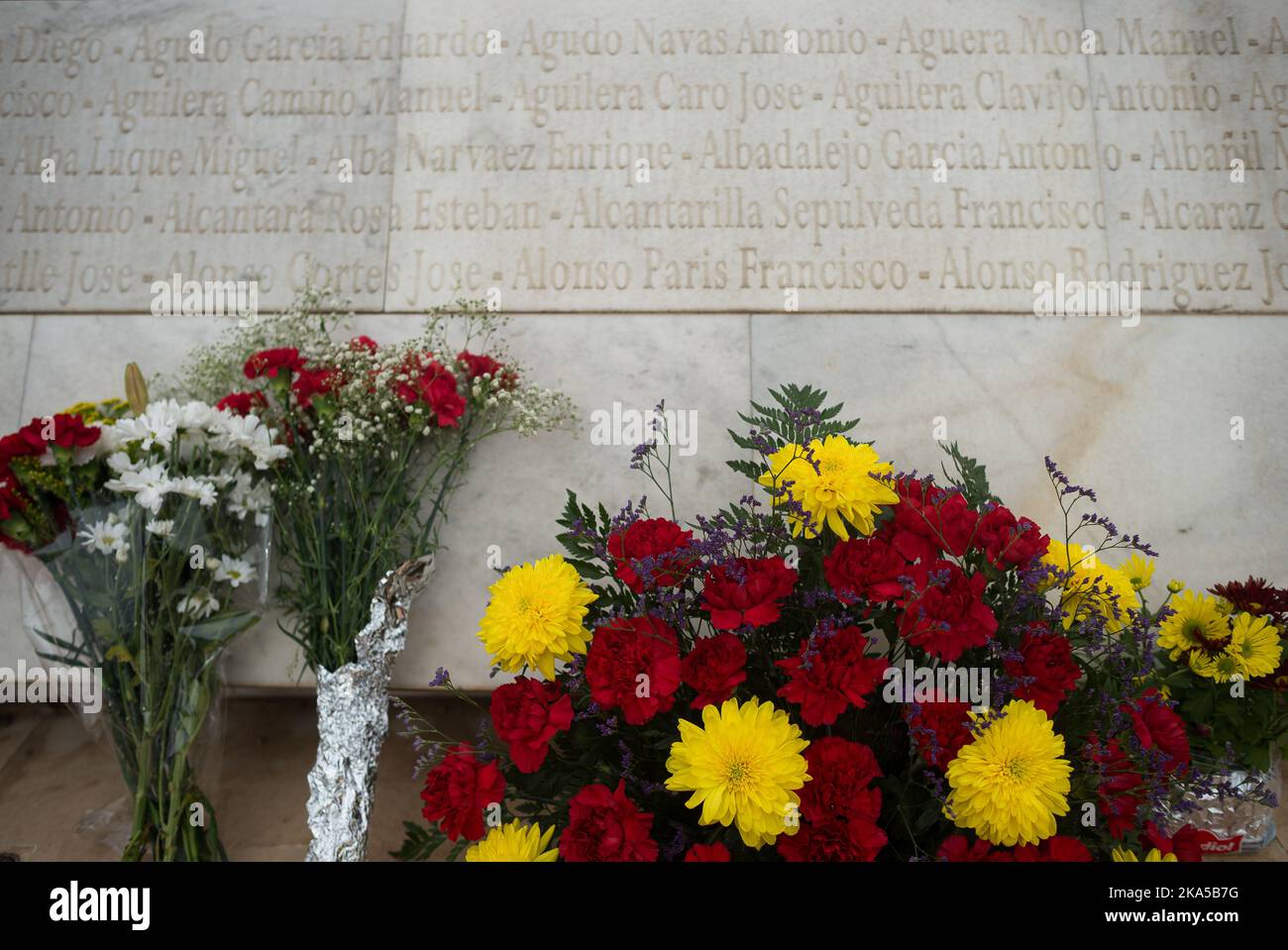 Malaga, Spain. 31st Oct, 2022. Flowers are seen placed on the facade of ...