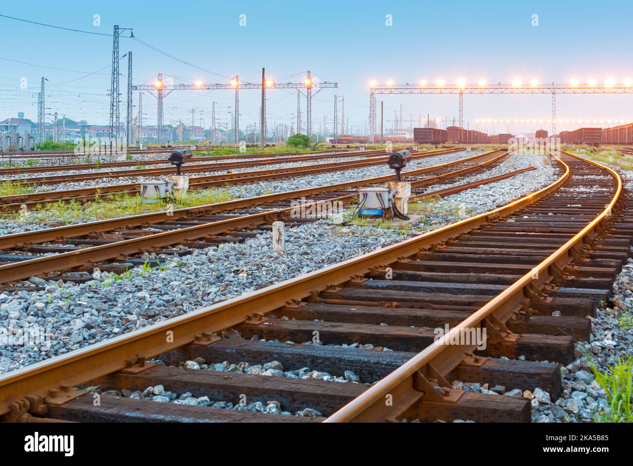 Cargo train platform at sunset with container Stock Photo - Alamy