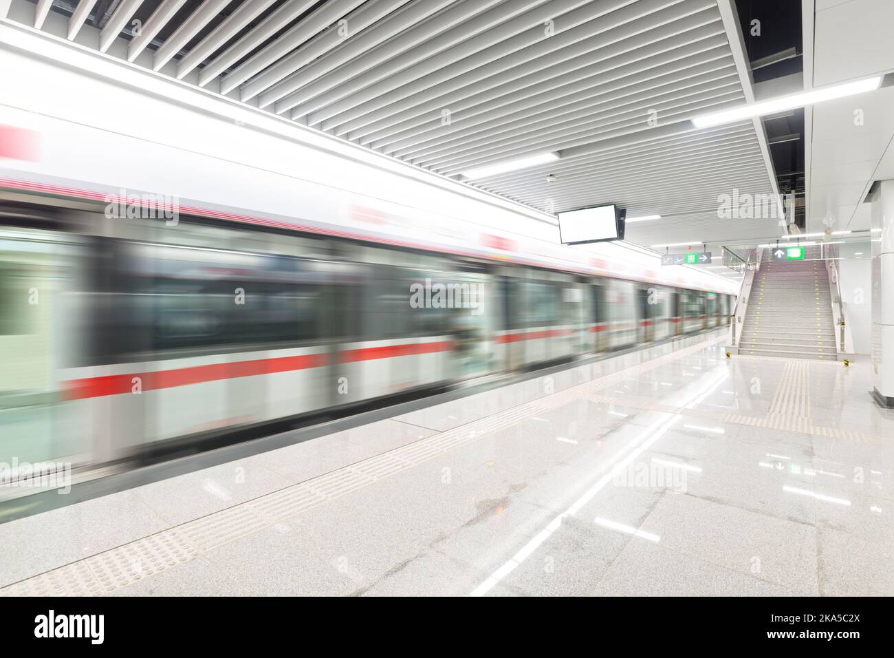 train fast moving at subway station Stock Photo - Alamy