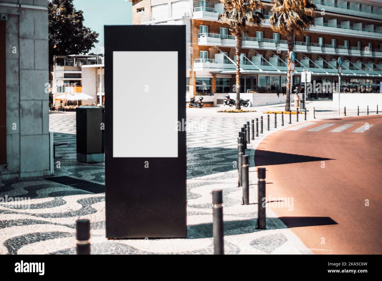 A vertical narrow banner placeholder on the city street next to the ...