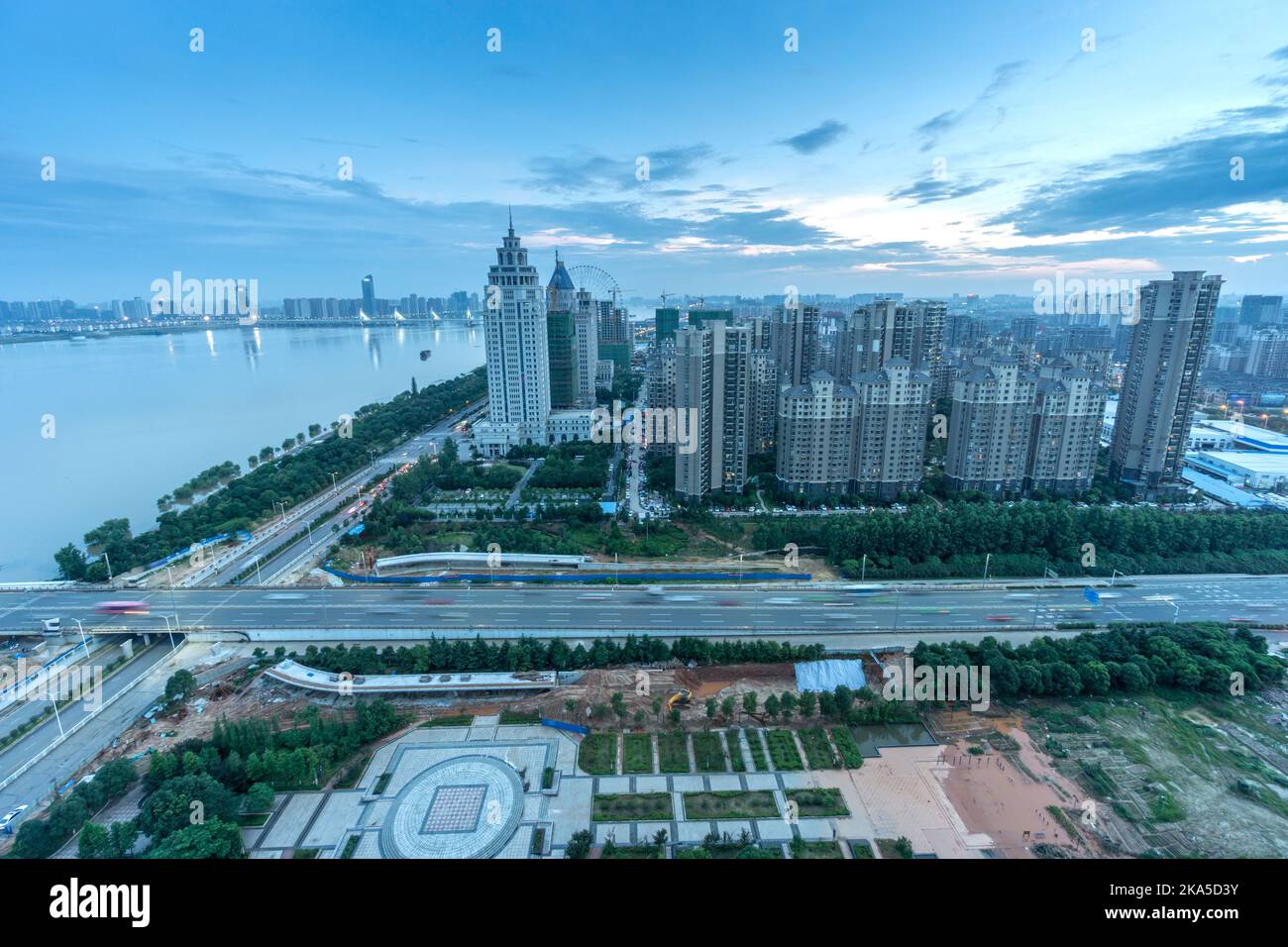 Bird view at Wuhan China. Skyscraper under construction in foreground ...
